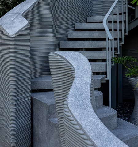 Structural Optimization in Robotic Concrete Construction